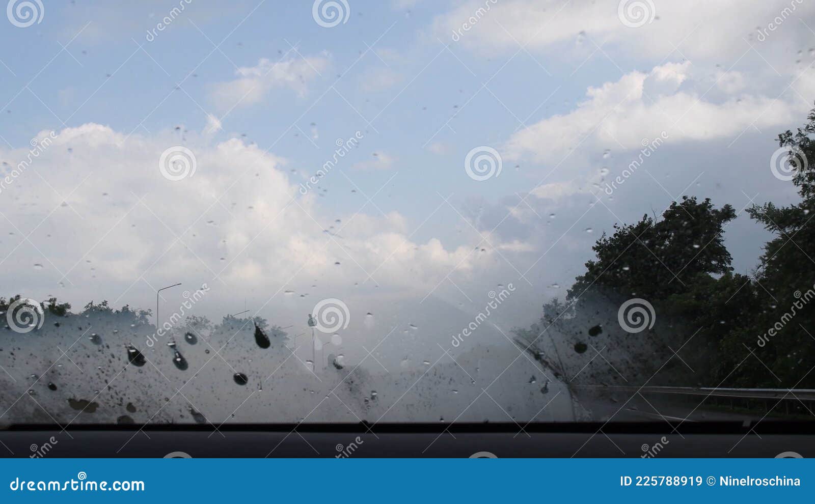 Misting Glass of Windshield with Raindrops and Blurred Background Stock ...