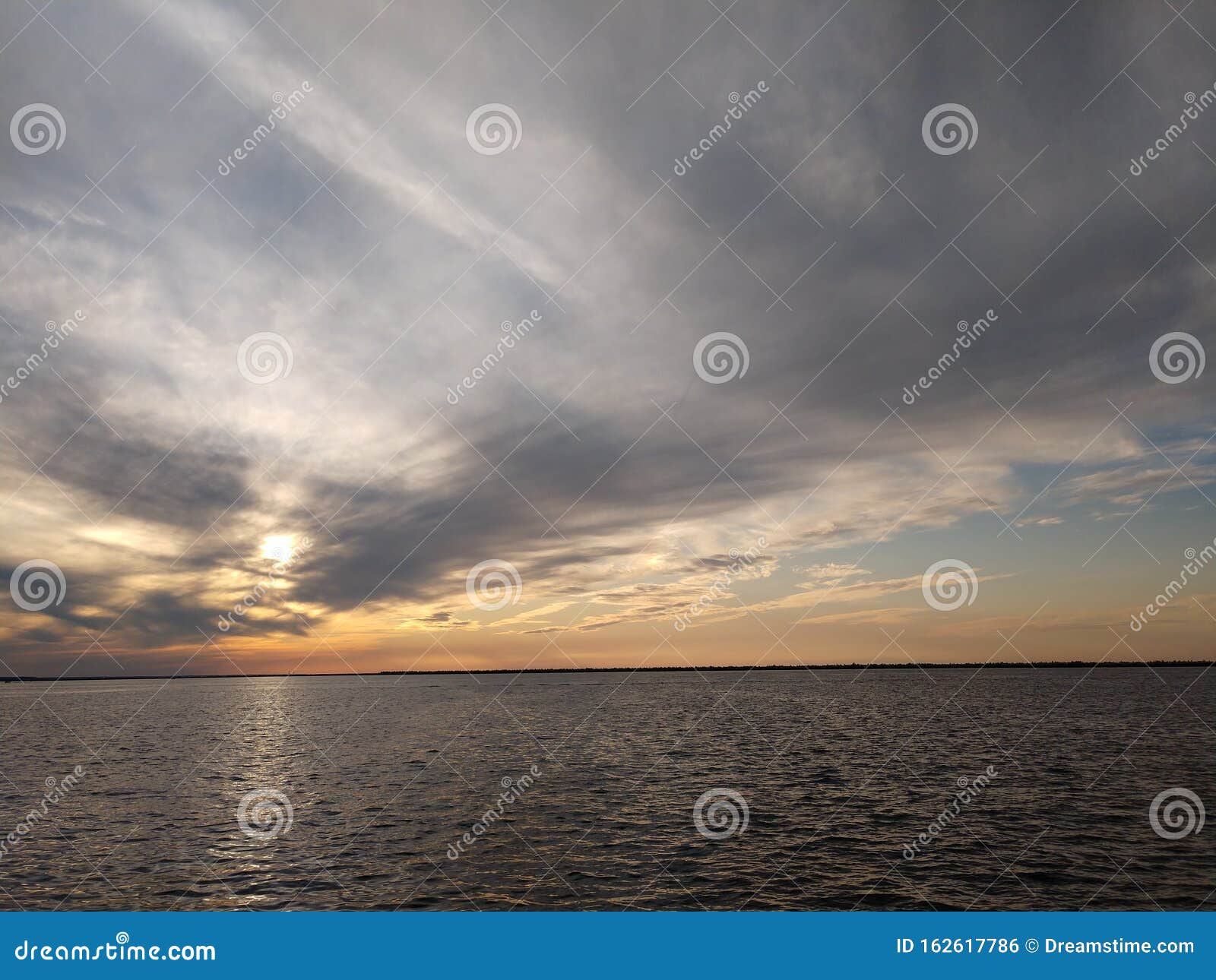 Misty ocean stock photo. Image of misty, setting, blue - 162617786