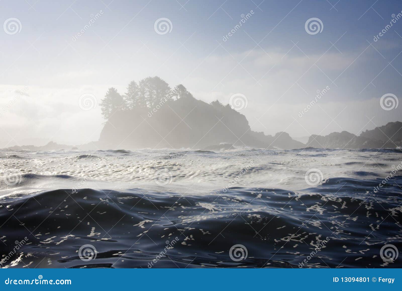 Misty island on the ocean stock image. Image of mist - 13094801