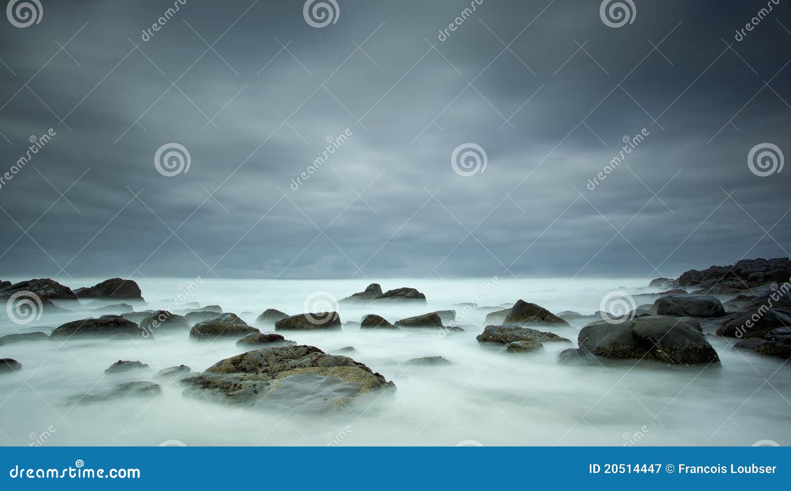 Misty sea and rocks stock image. Image of ocean, evening - 20514447