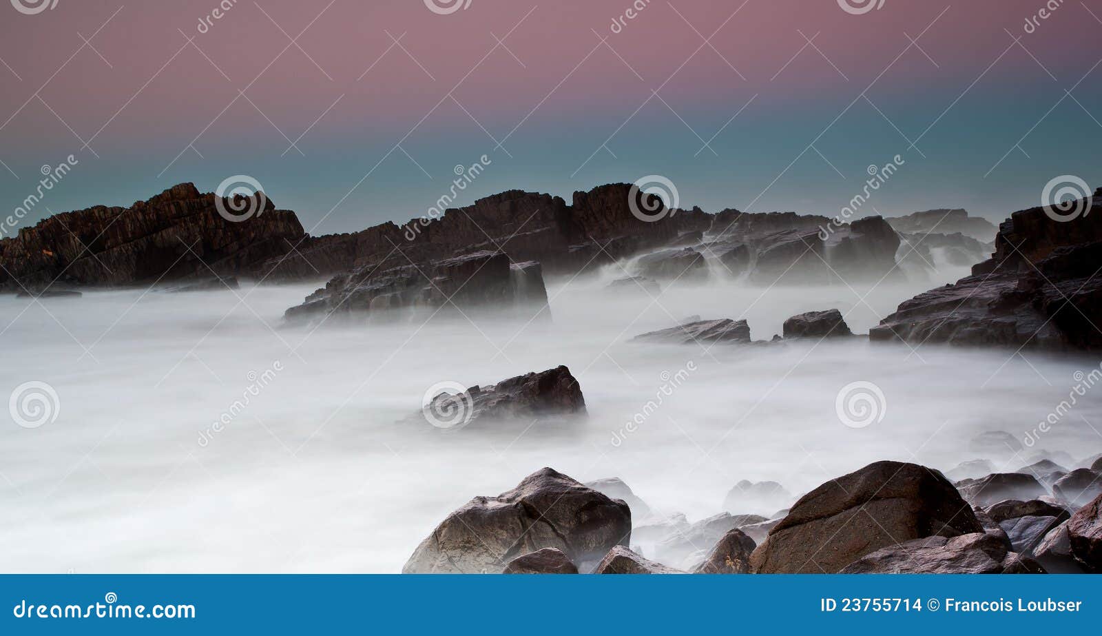 Misty sea and rocks stock photo. Image of island, dream - 23755714
