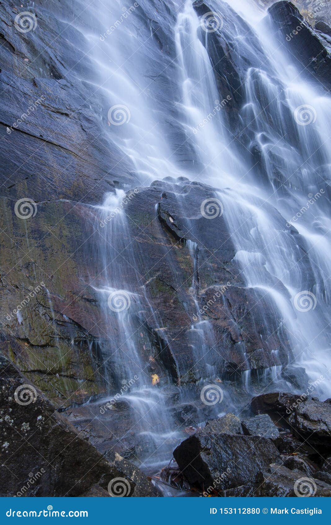 Misty Water Cascading Over Rocks Stock Photo - Image of mountain, stone ...