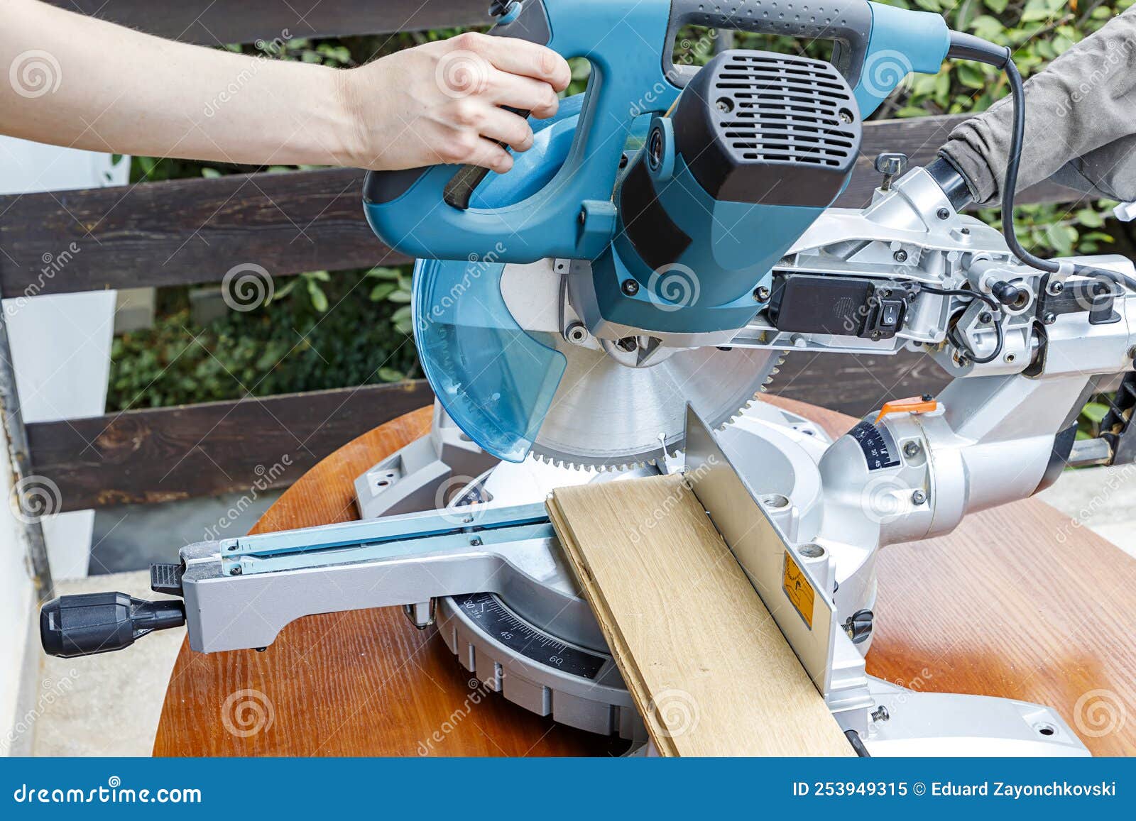 Miter Saw in the Process of Sawing Off a Wooden Part Stock Image ...