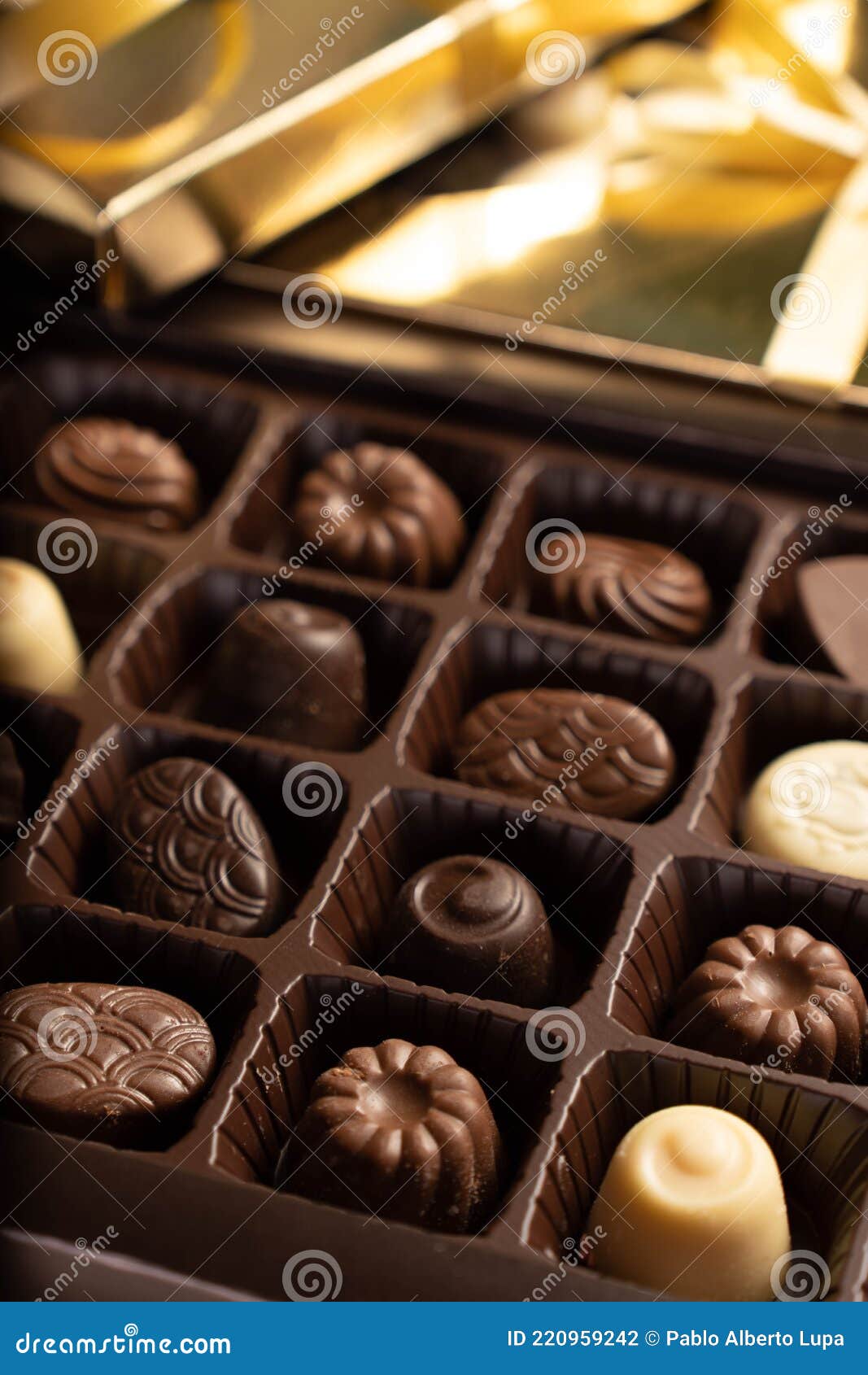 Mix of chocolates in a box stock photo. Image of food - 220959242