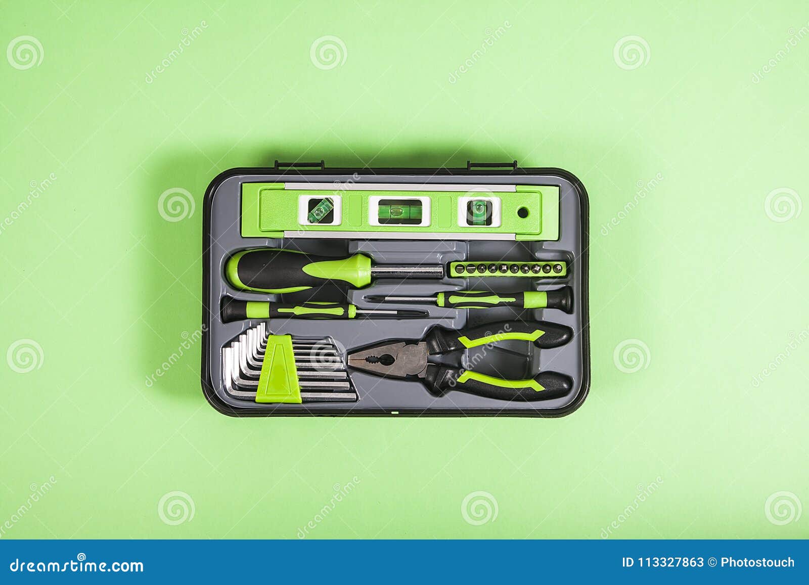 Mix of Different Tools in One Box on Green Background Stock Image ...