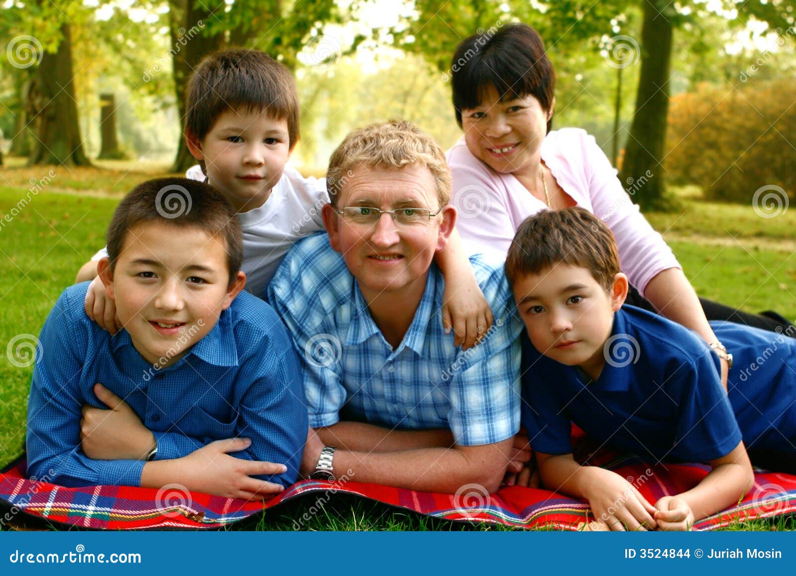 A mix-marriage family stock photo. Image of gather, nurture - 3524844