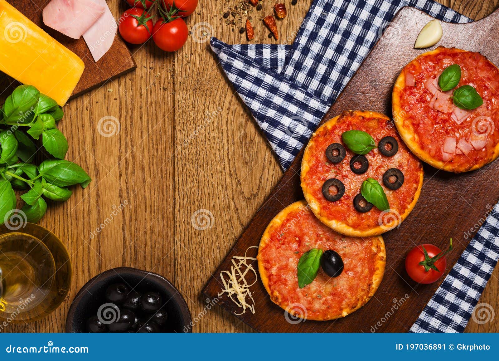 Mix of Mini Pizzas on Wooden Board Stock Image - Image of little ...
