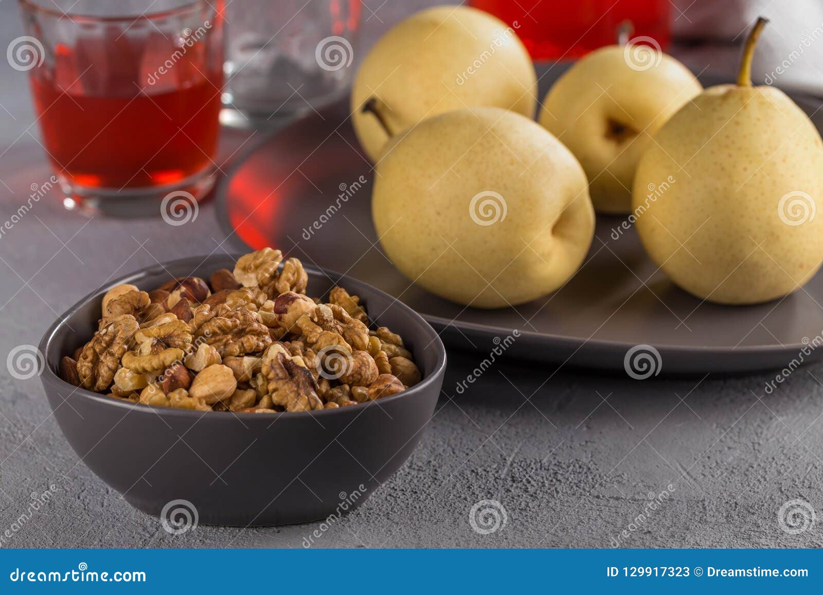 Mix of Nuts of Different Varieties in a Black Bowl on the Background of ...