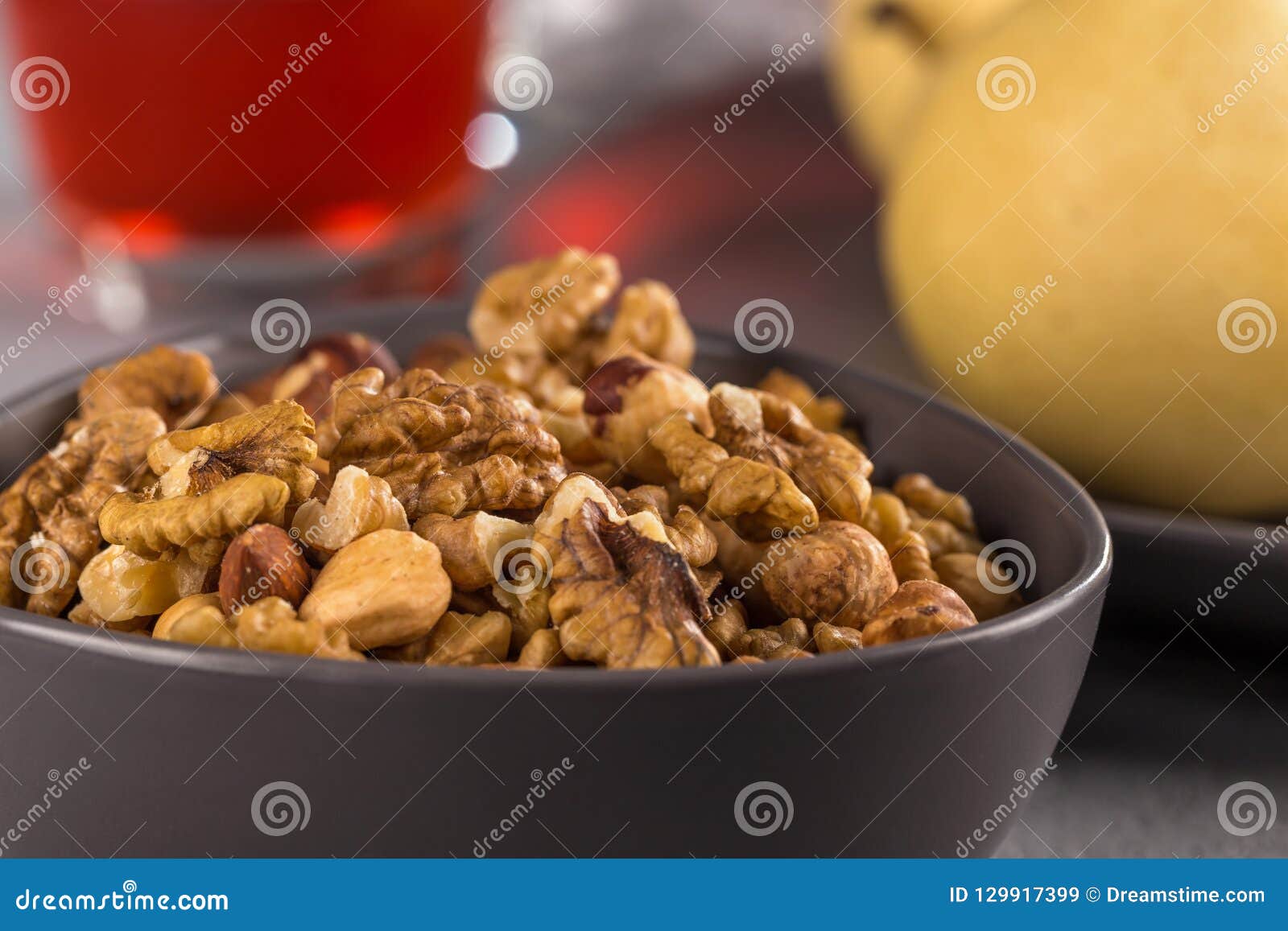 Mix of Nuts of Different Varieties in a Black Bowl on the Background of ...