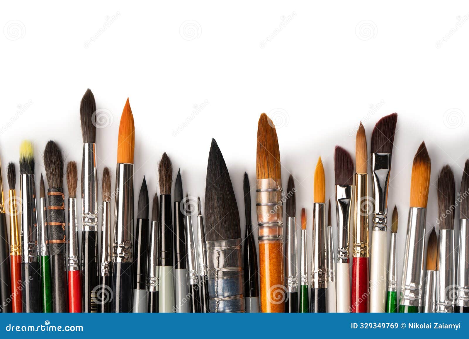 Mix of Paint Brushes in a Row Isolated on a White Background. Top View ...