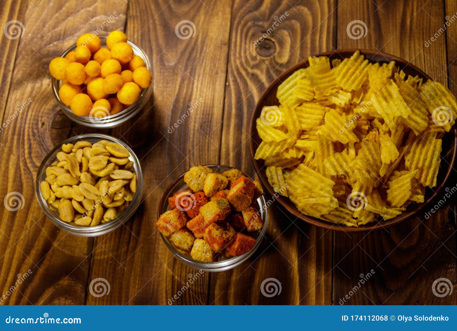 Mix of Snacks for Beer on Wooden Table Stock Photo - Image of bowl ...