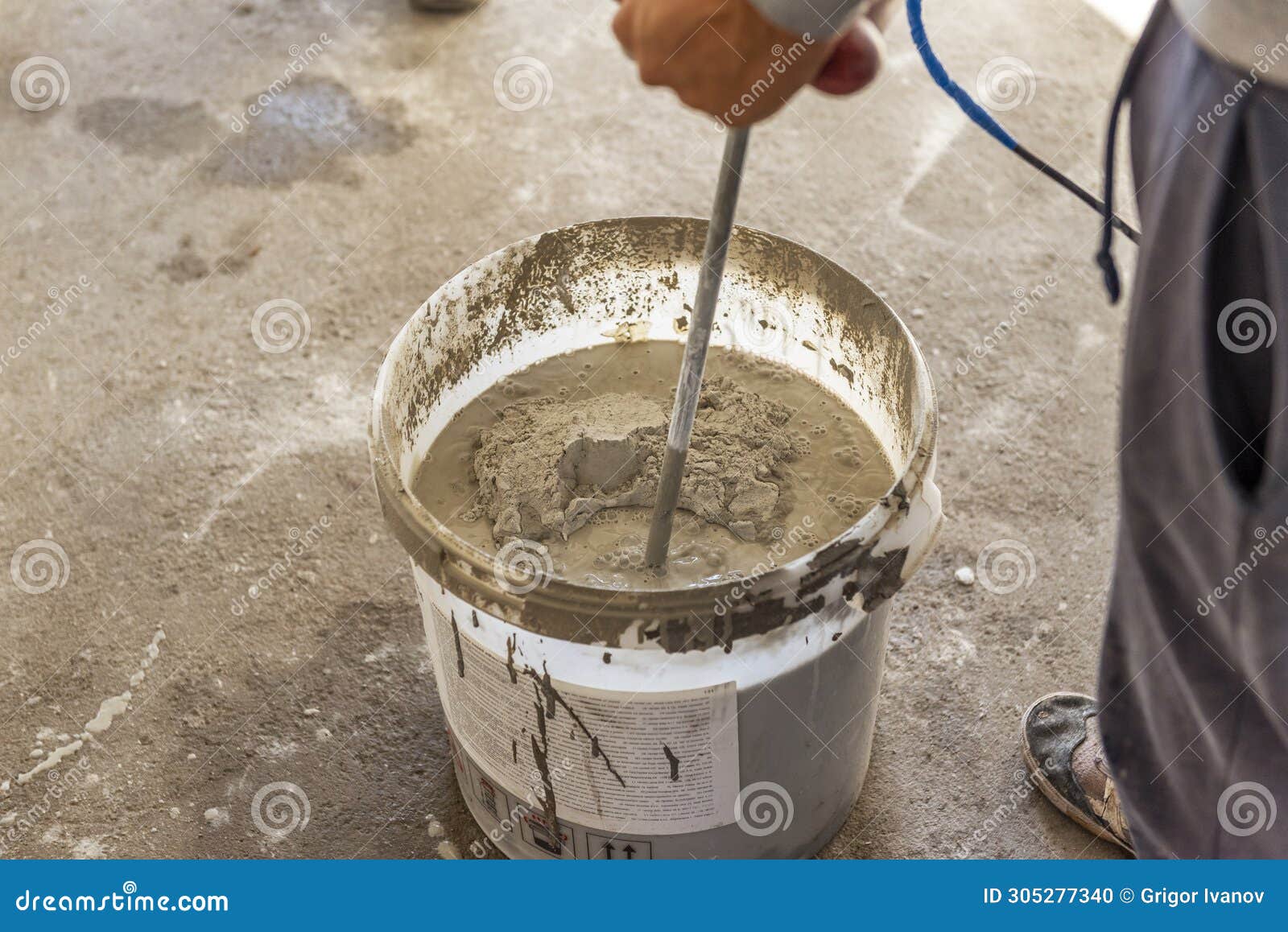 Mix the Solution with a Self-leveling Floor in a Bucket Stock Photo ...