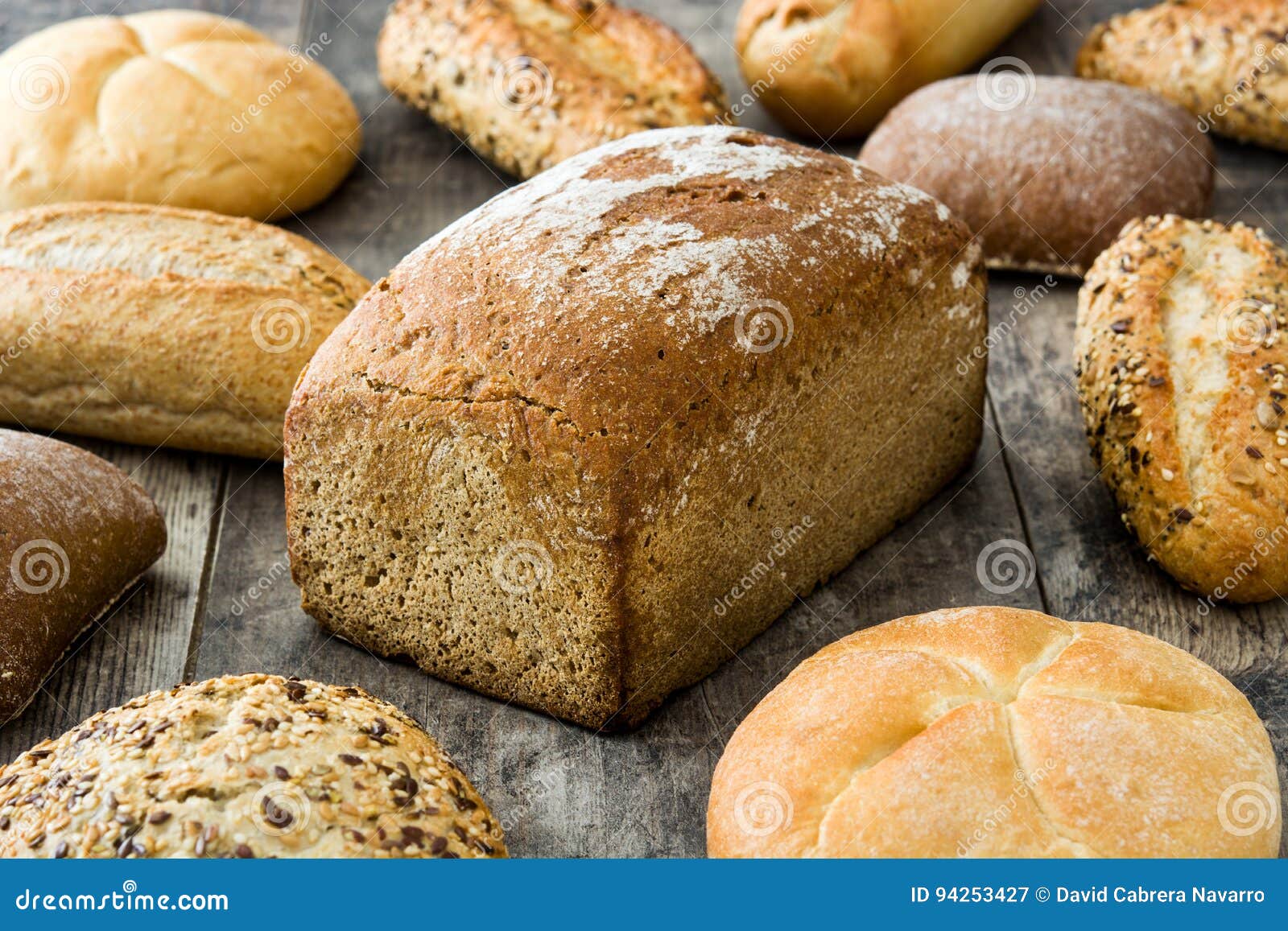 Mixed Breads on Wooden Table Stock Image - Image of eating, baked: 94253427