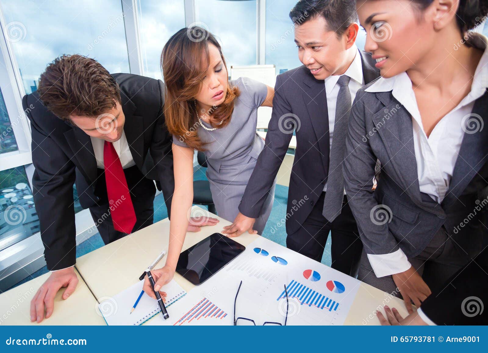 Mixed Business Team Discussing Earnings Stock Image - Image of profit ...