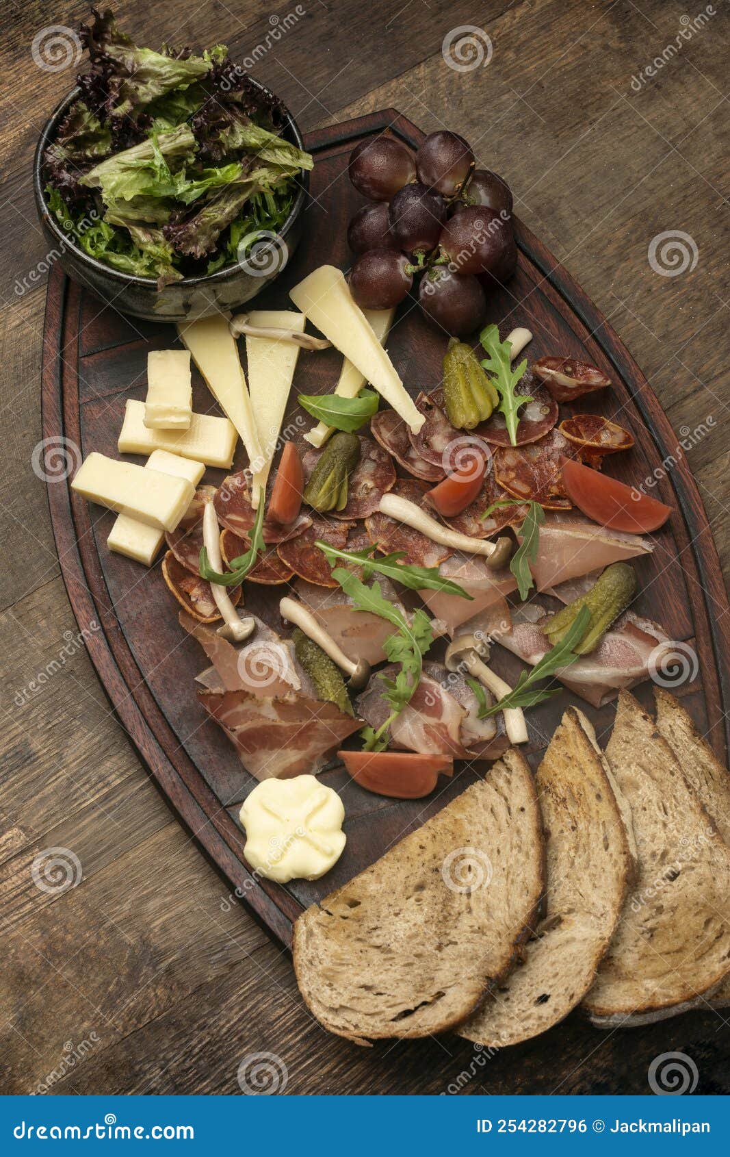 Mixed Cheese and Cold Cuts Board on Wood Background Stock Photo - Image ...