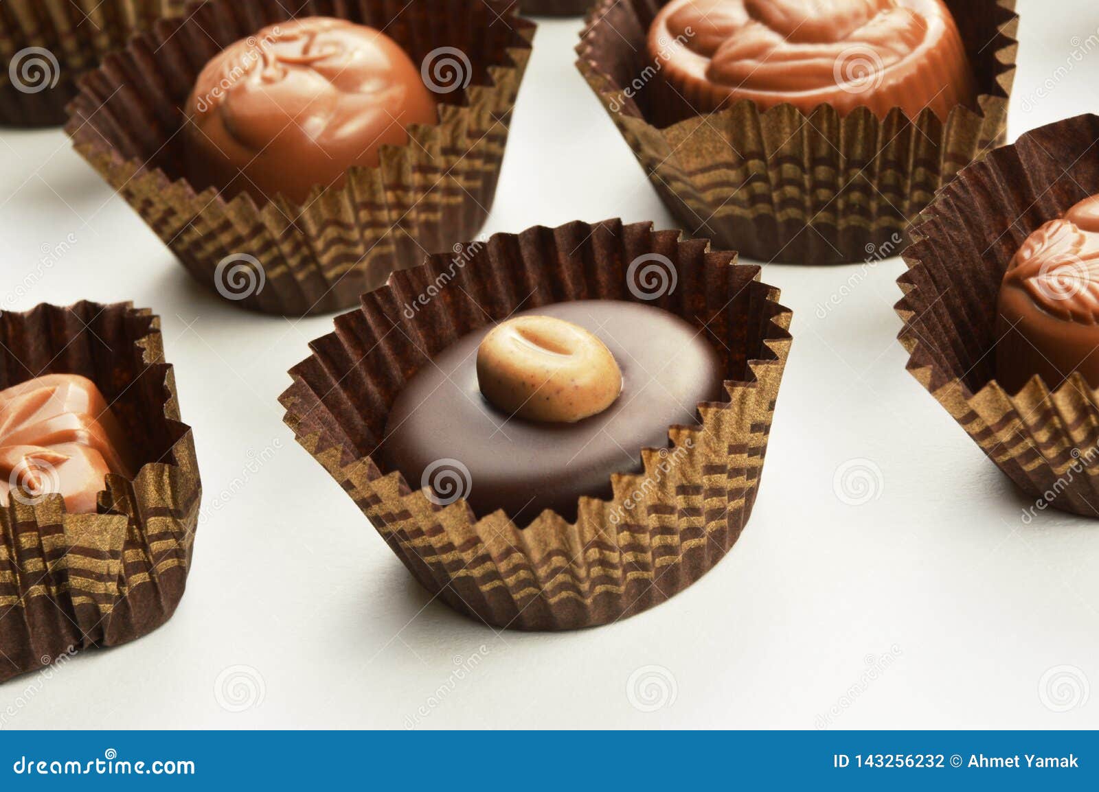 Mixed chocolate candies stock photo. Image of brown - 143256232