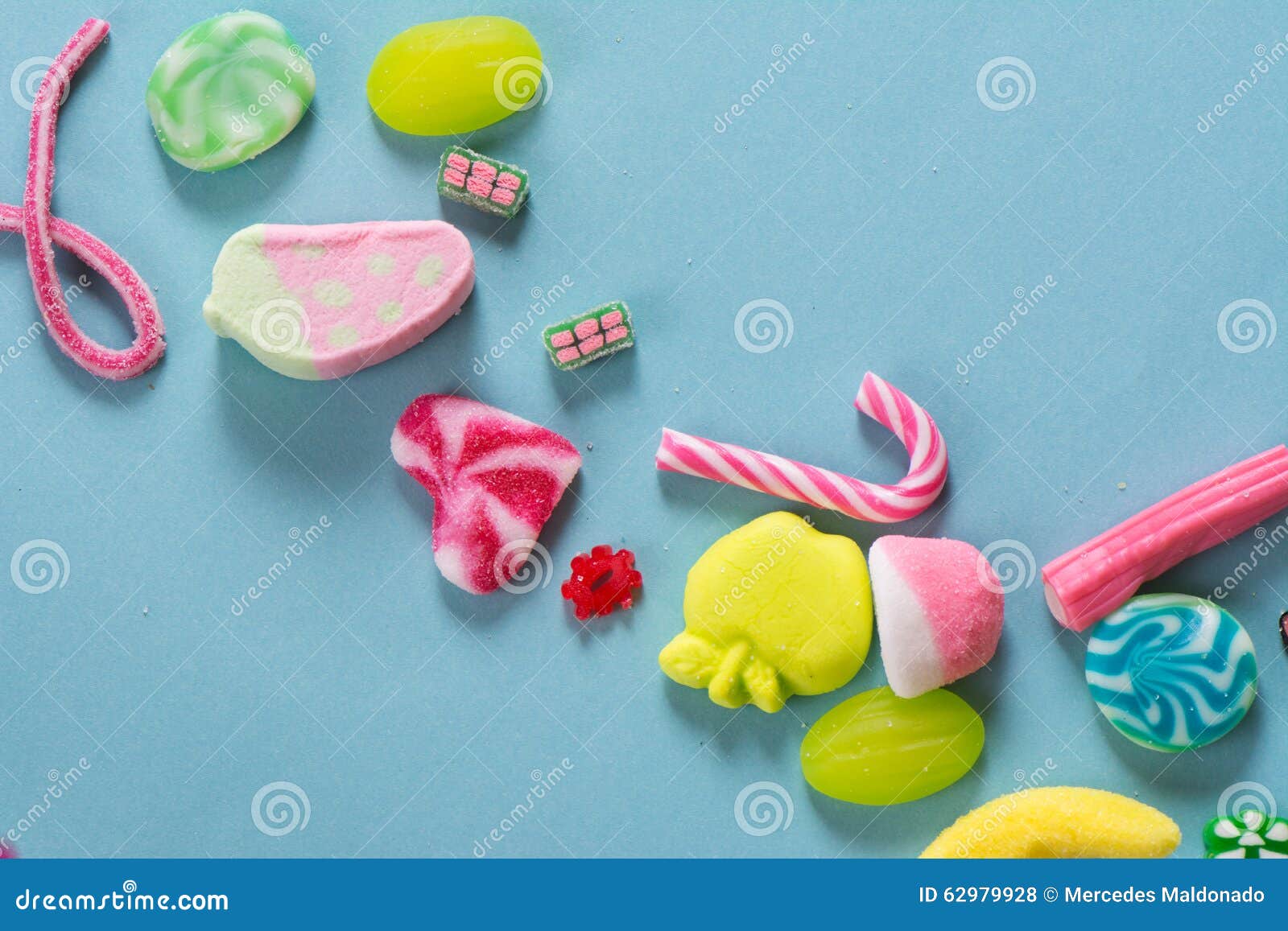 Mixed Colorful Candy on Blue Background, Kids Holidays Stock Photo ...
