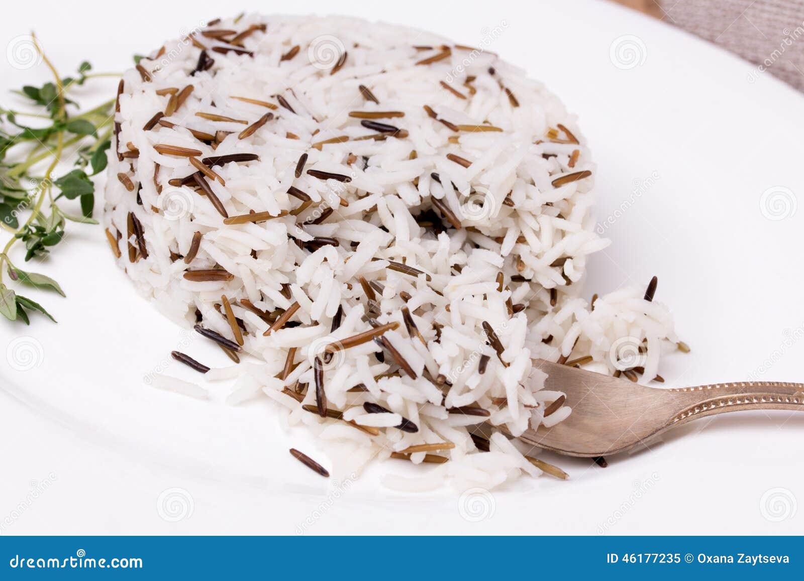Mixed Cooked Rice with Thyme on White Plate Stock Image - Image of ...