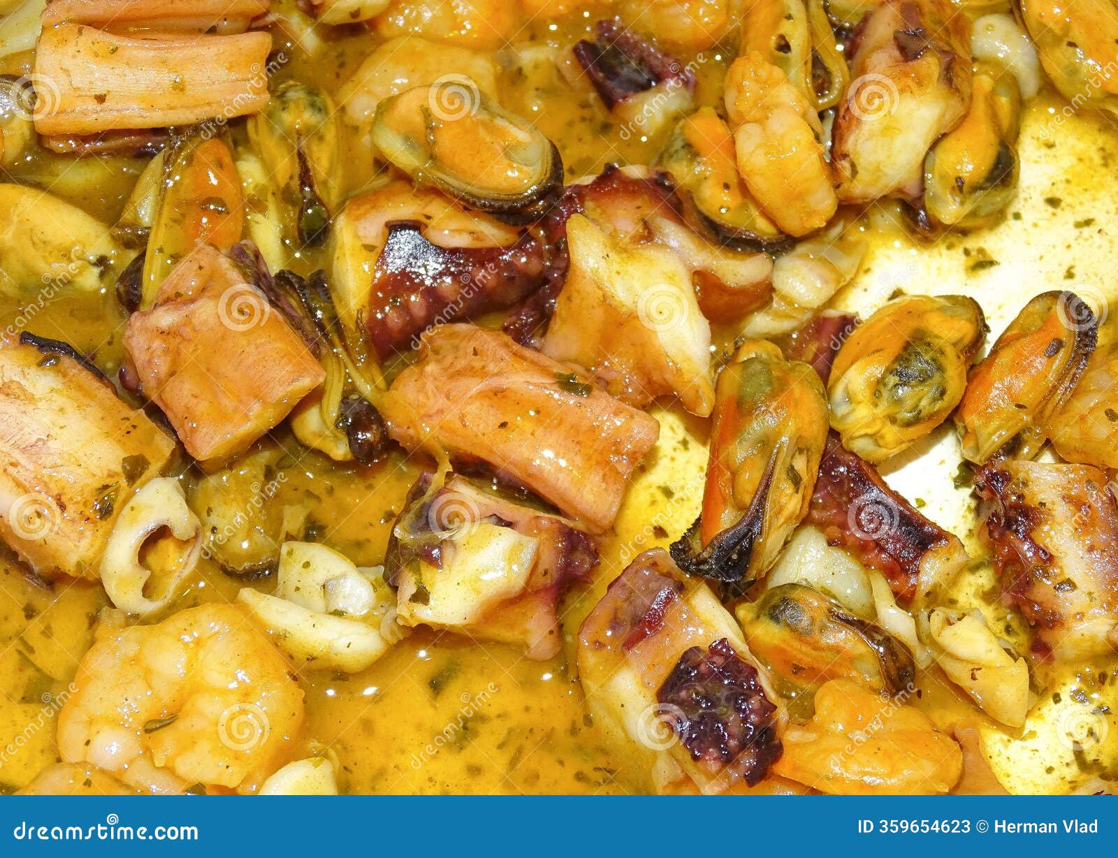 Cooked Seafood On A Black Background. Baked Salmon With Onion, Lemon ...