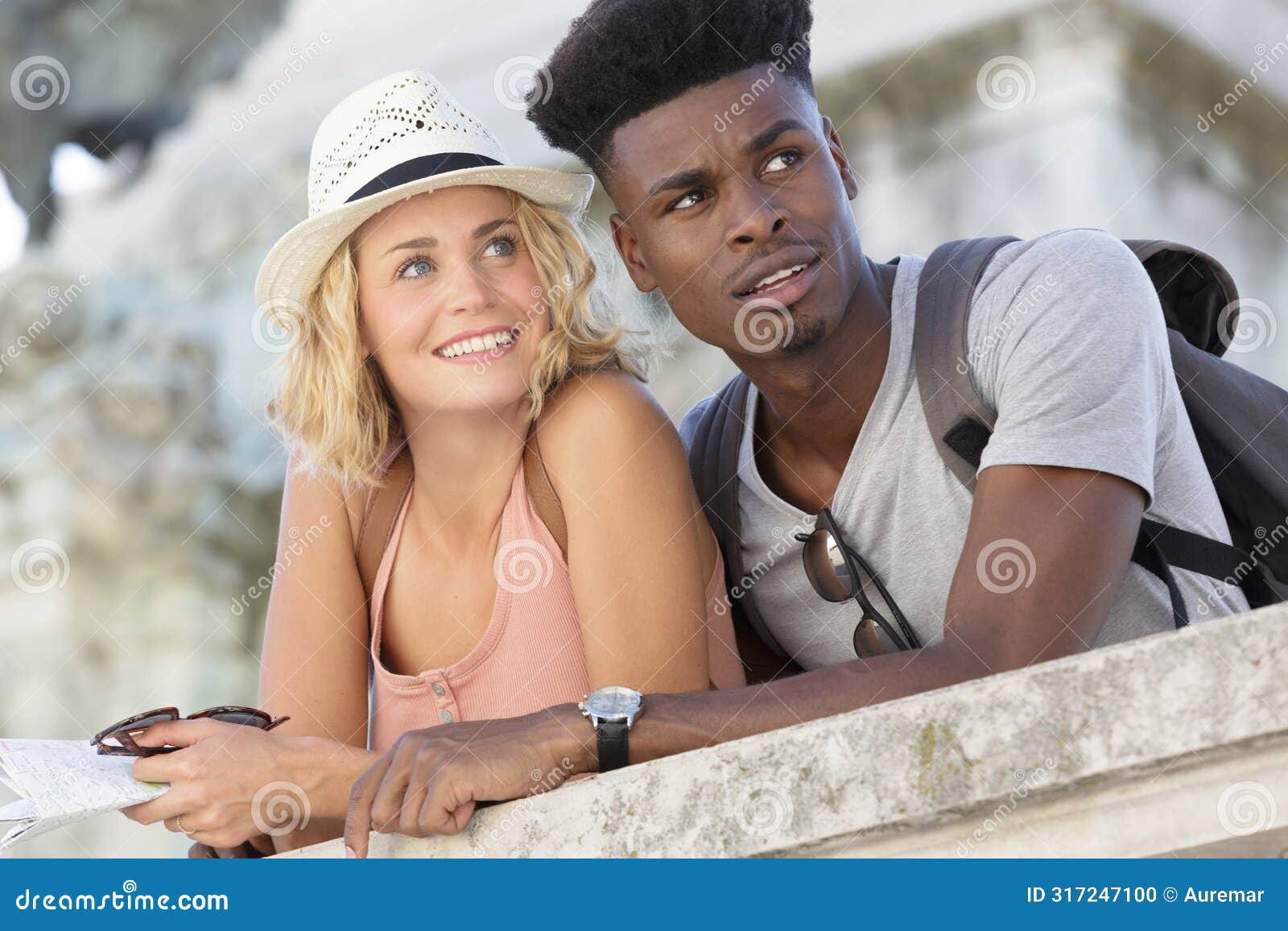 Mixed couple on holidays stock photo. Image of people - 317247100