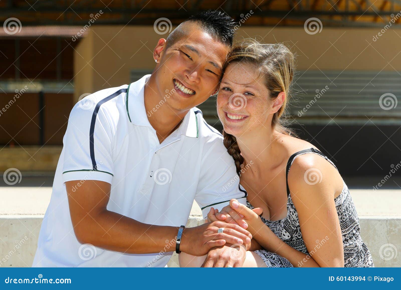 Mixed Couple Sitting stock photo. Image of vacation, ethnic - 60143994
