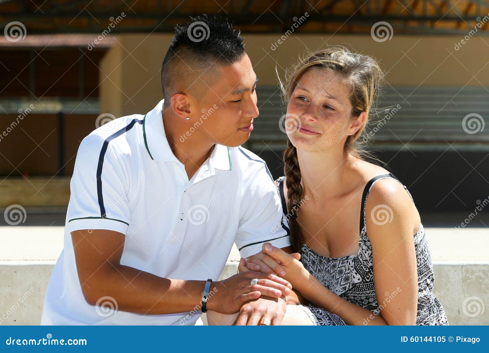 Mixed Couple Sitting stock image. Image of multiracial - 60144105