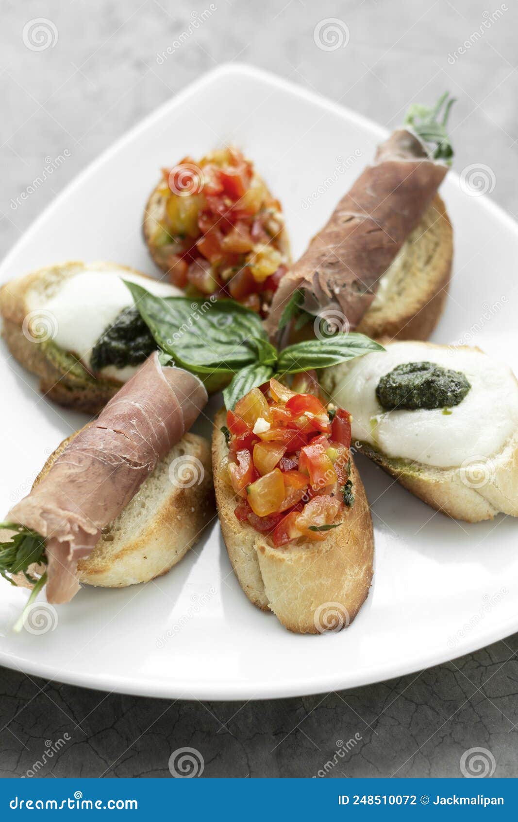 Mixed Crostini Appetizers with Parma Ham, Bruschetta and Mozarella ...