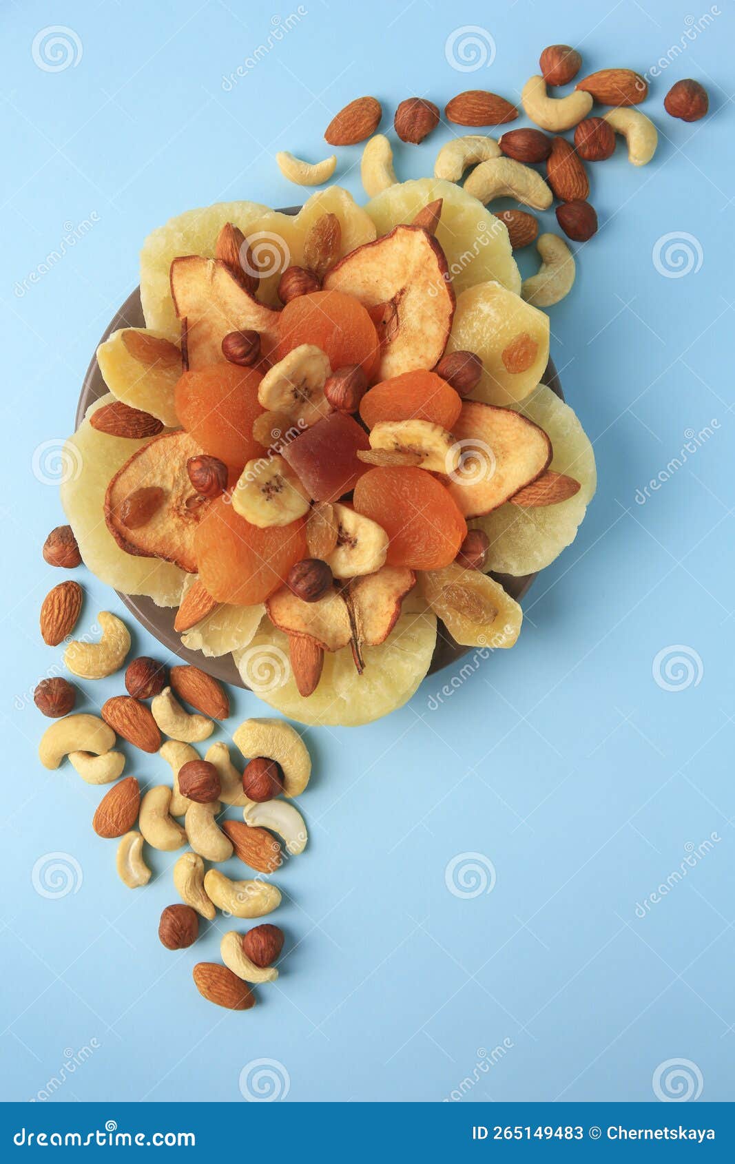 Mixed Dried Fruits and Nuts on Light Blue Background, Flat Lay Stock ...