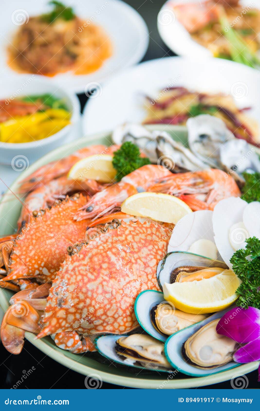 Mixed Fresh Seafood on Dish Stock Image - Image of crab, lime: 89491917