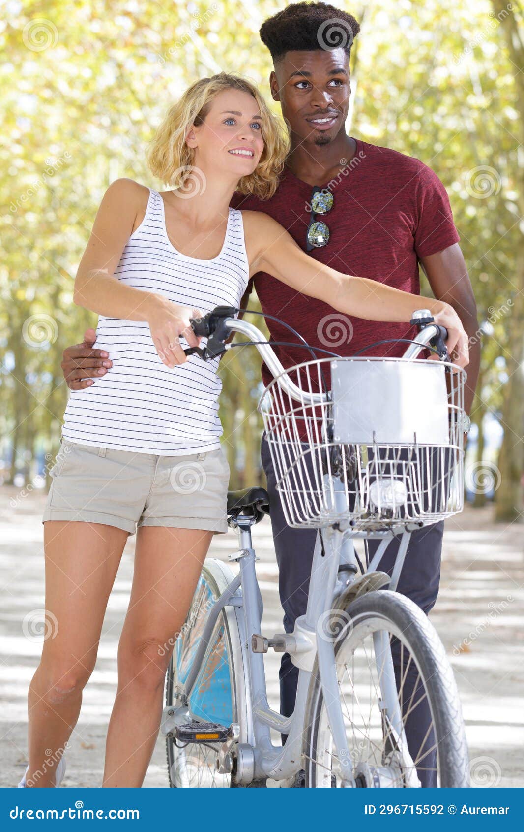 Mixed Friends Having Fun on Bike Stock Photo - Image of bike, carefree ...