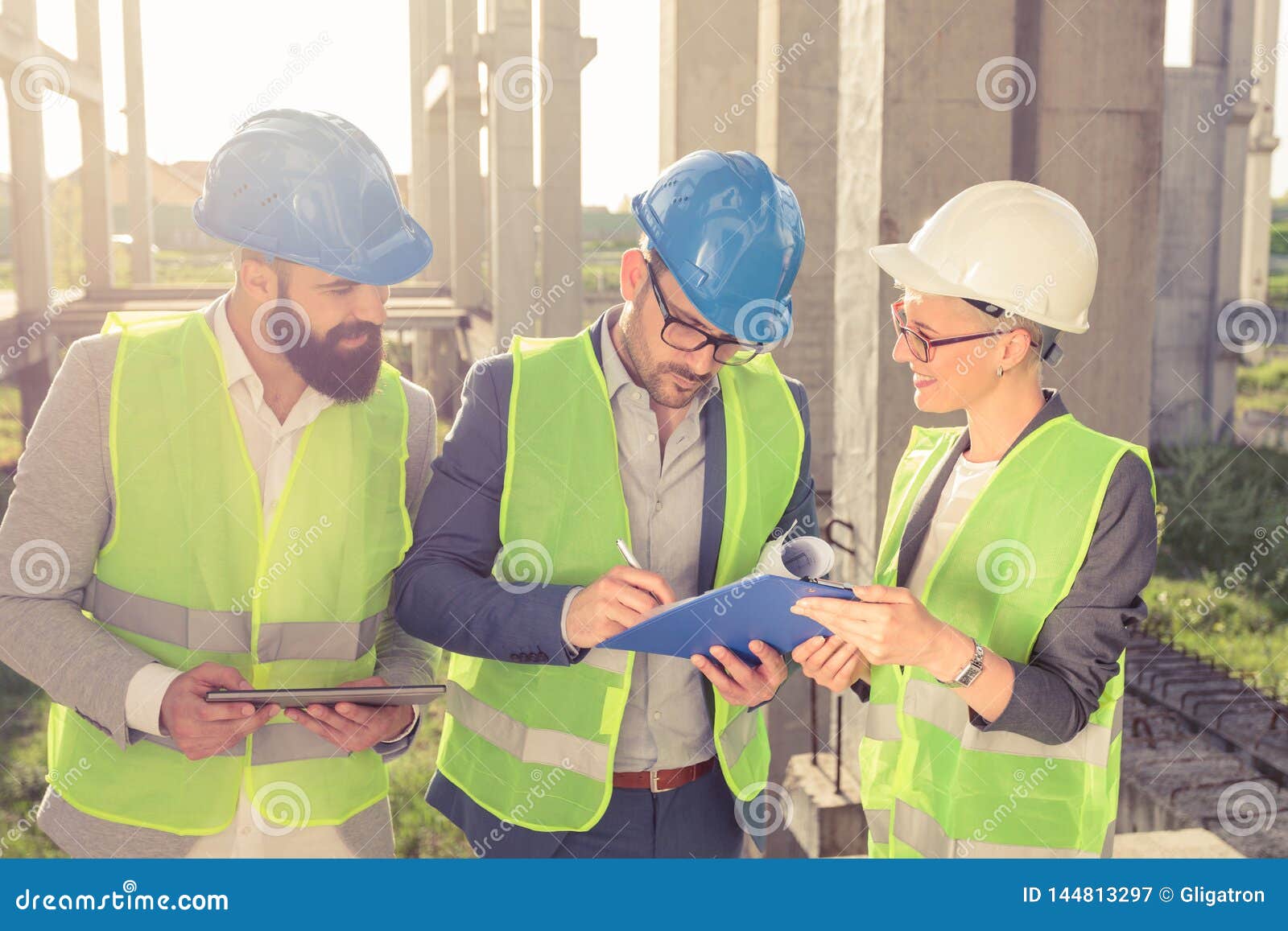 Group of Architects or Business Partners Having a Meeting and Signing ...