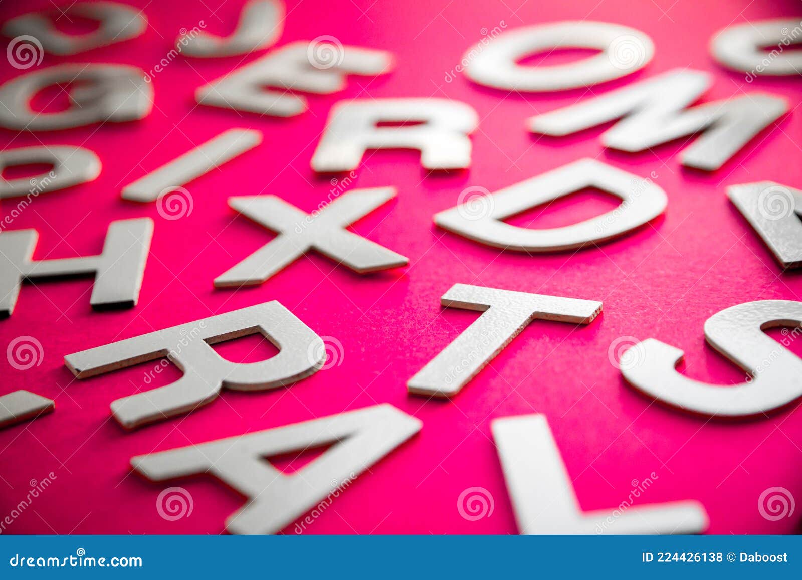 Mixed Letters Pile Close Up View Photo. Pink Background Stock Photo ...