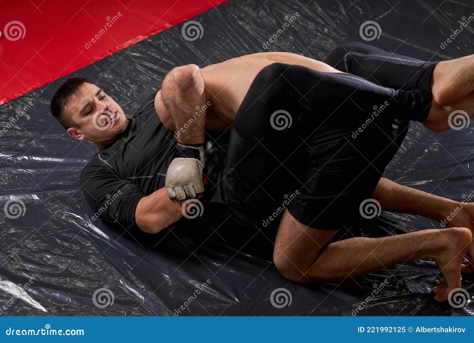 Mixed Martial Artists Fighting on Mat Using Grappling, Fight without ...