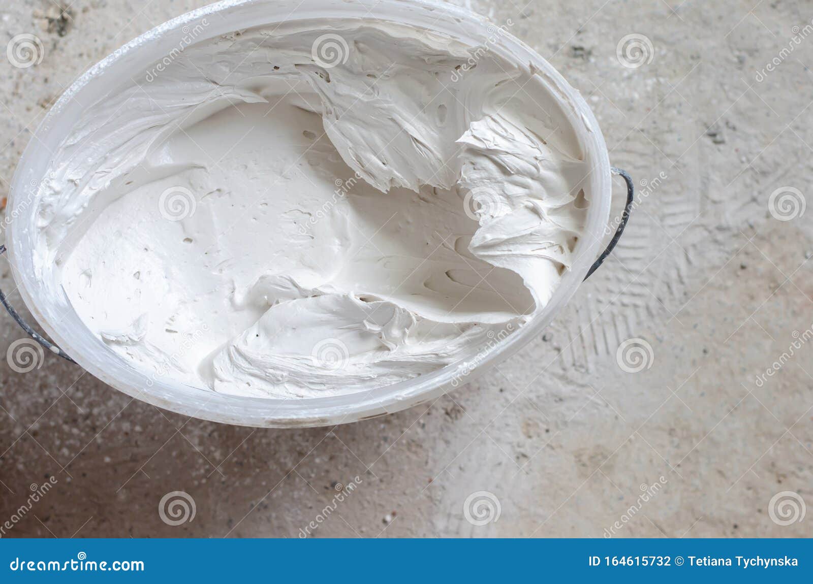 Mixed Putty Solution in a Pail Ready To Be Used. Construction Works ...