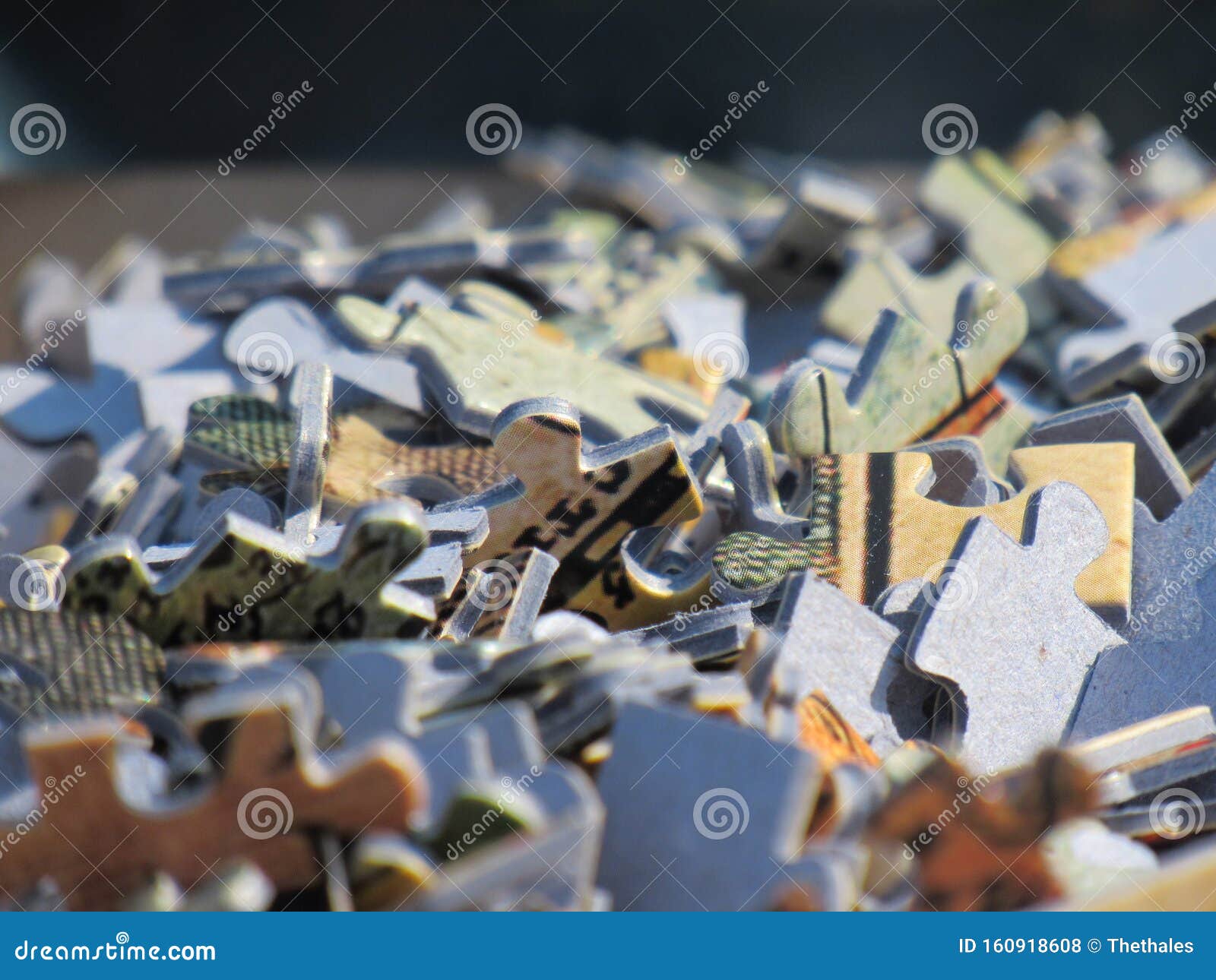 Mixed Puzzle Pieces in a Box Stock Photo - Image of mixed, little ...