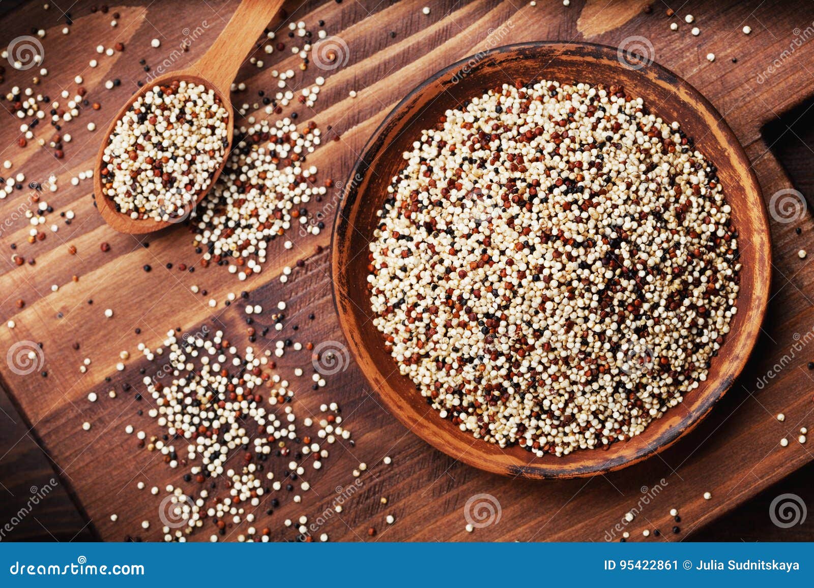 Mixed Quinoa in Bowl on Wooden Kitchen Board Top View. Stock Image ...