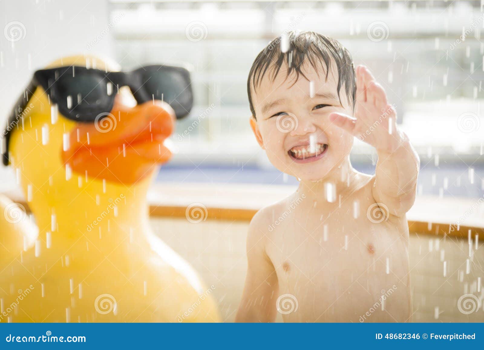Mixed Race Boy Having Fun at the Water Park Stock Photo - Image of ...