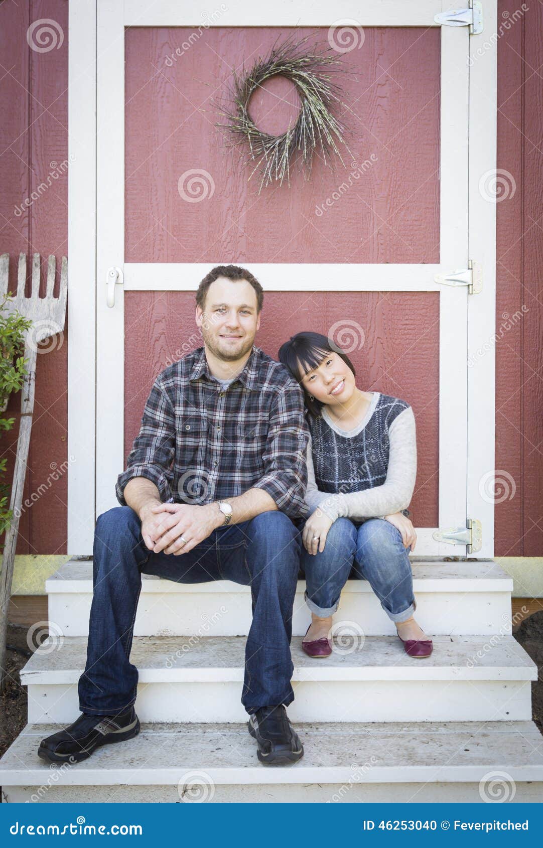 Mixed Race Couple Relaxing on the Steps Stock Photo - Image of love ...