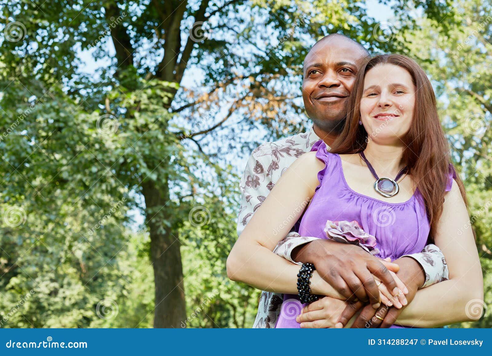 Mixed Race Couple Stands Embracing in Summer Stock Image - Image of ...