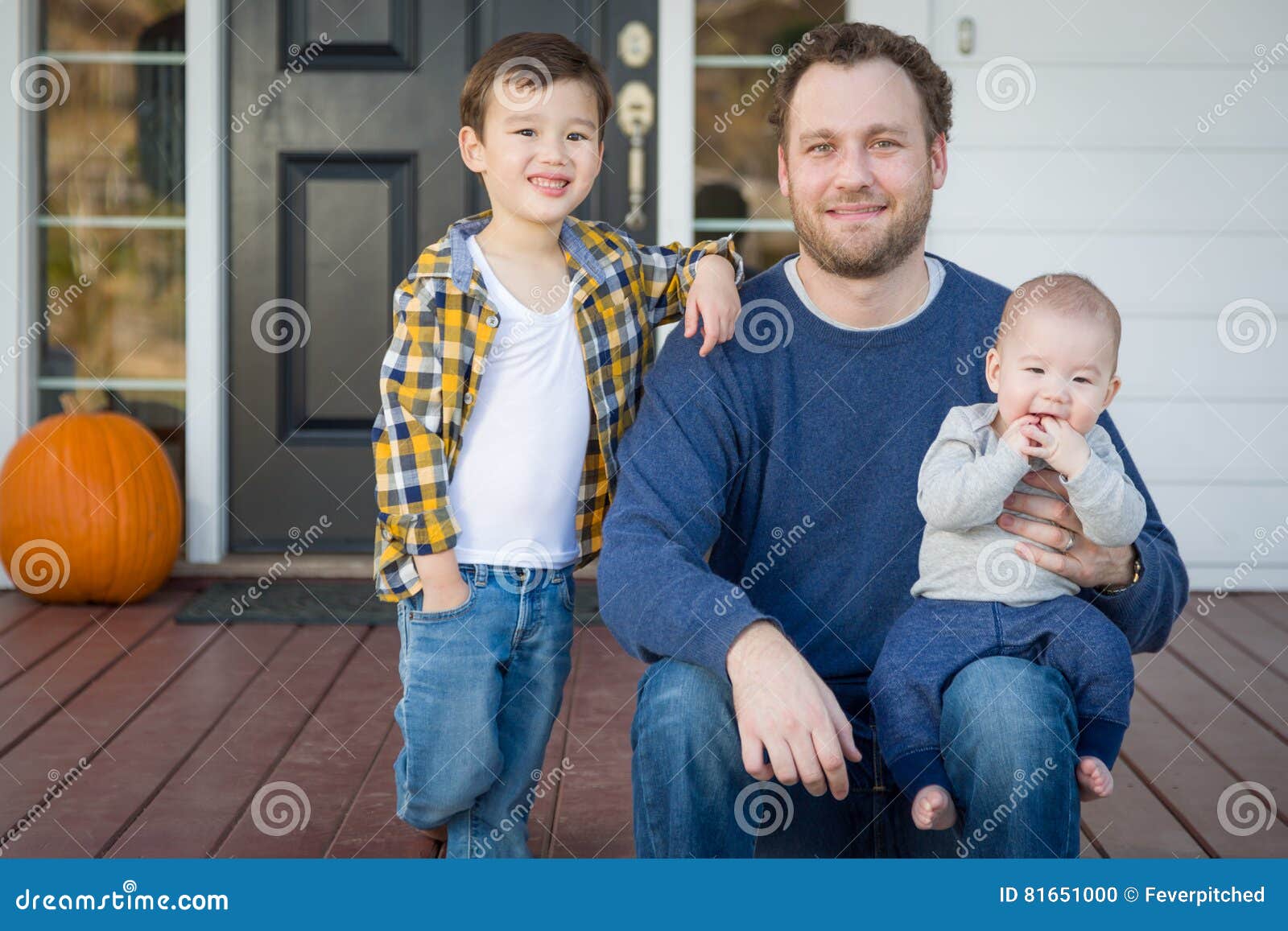 Mixed Race Father and Sons on Front Porch Stock Photo - Image of ...