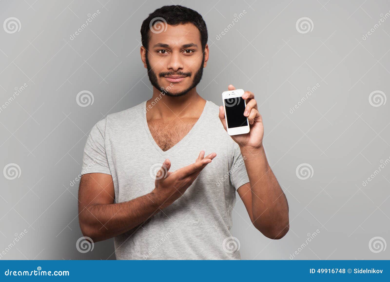 Mixed Race Man Pointing at Phone Stock Photo - Image of showing, camera ...