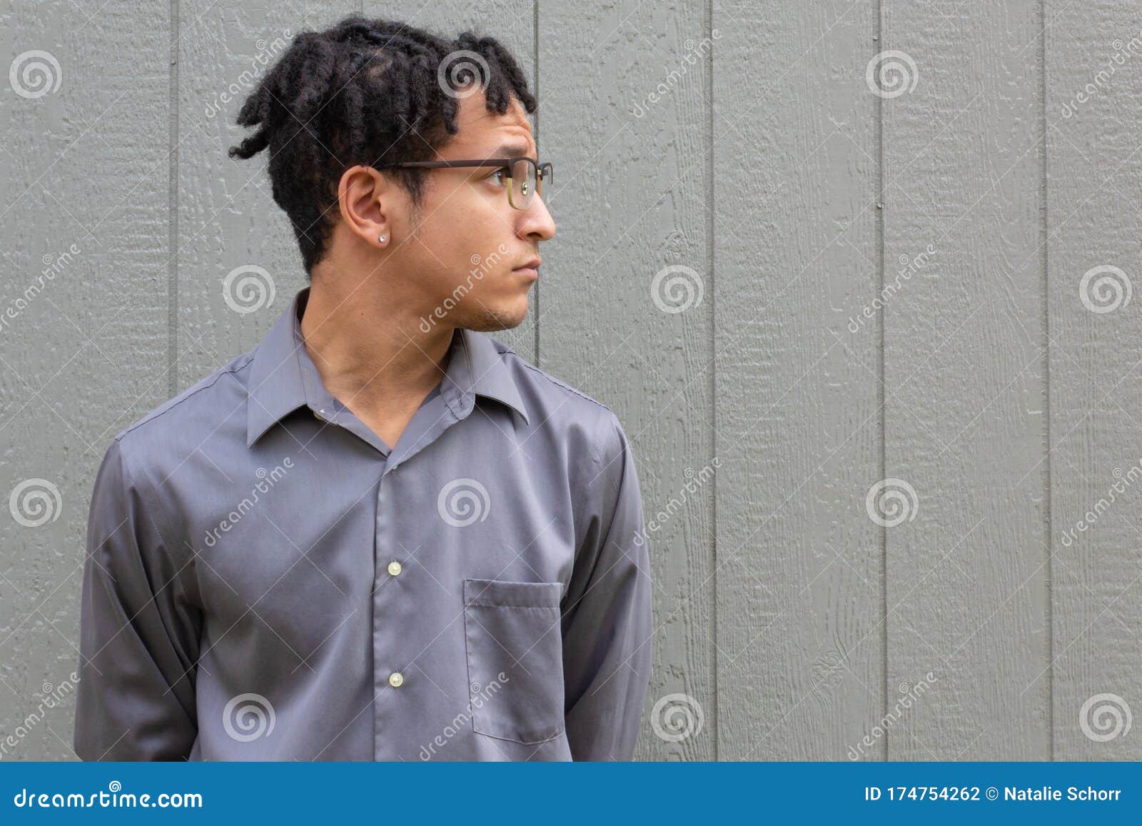 Mixed Race Millennial Man, Profile View in Glasses Looking Up, Neutral ...