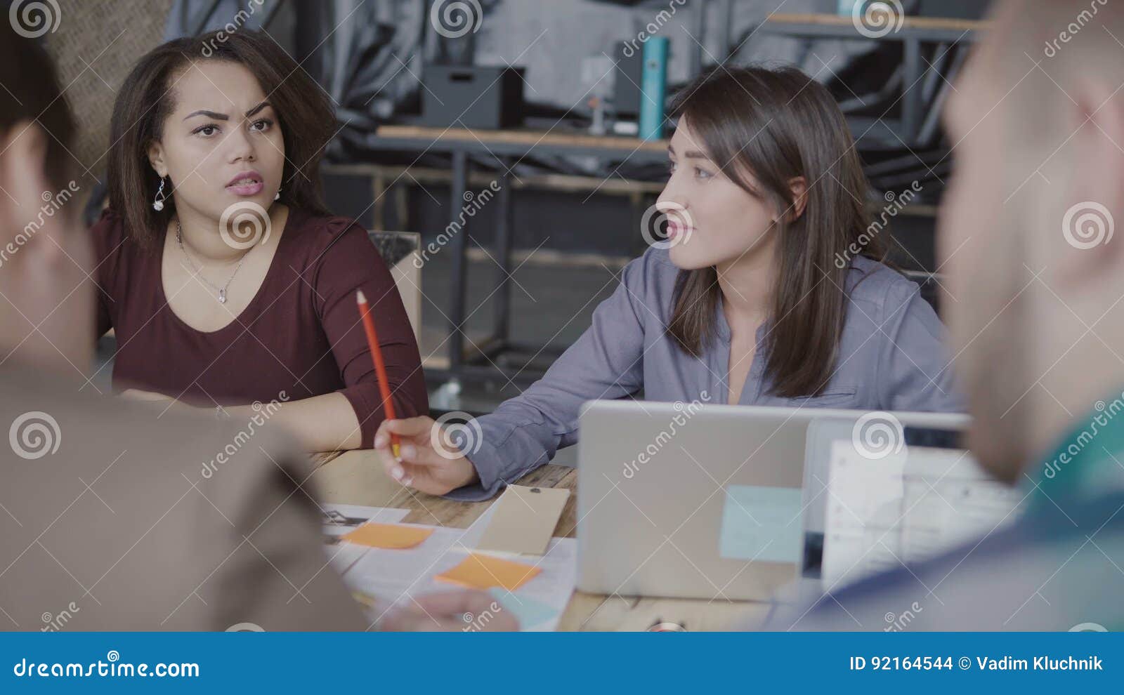 Mixed Race Team Working Together on Architectural Design in Modern Co ...