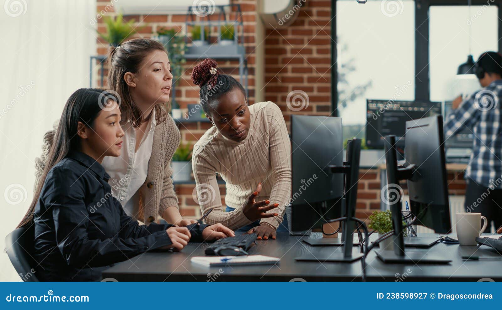 Mixed Team Of Programmers Analyzing Source Code Looking At Green Screen
