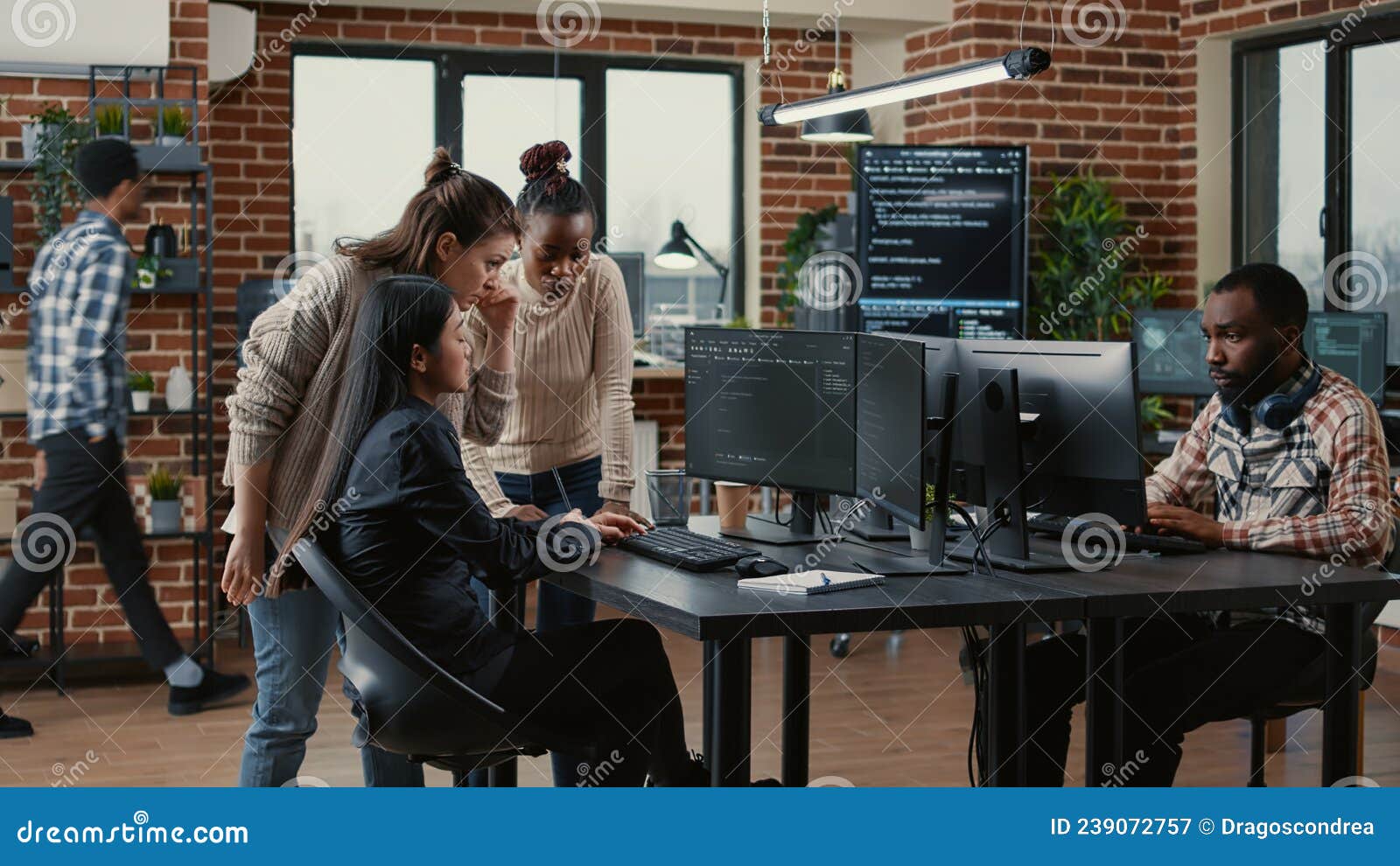Mixed Team Of Programmers Brainstorming Ideas For New Code Library In Front Of Computer Screens ...