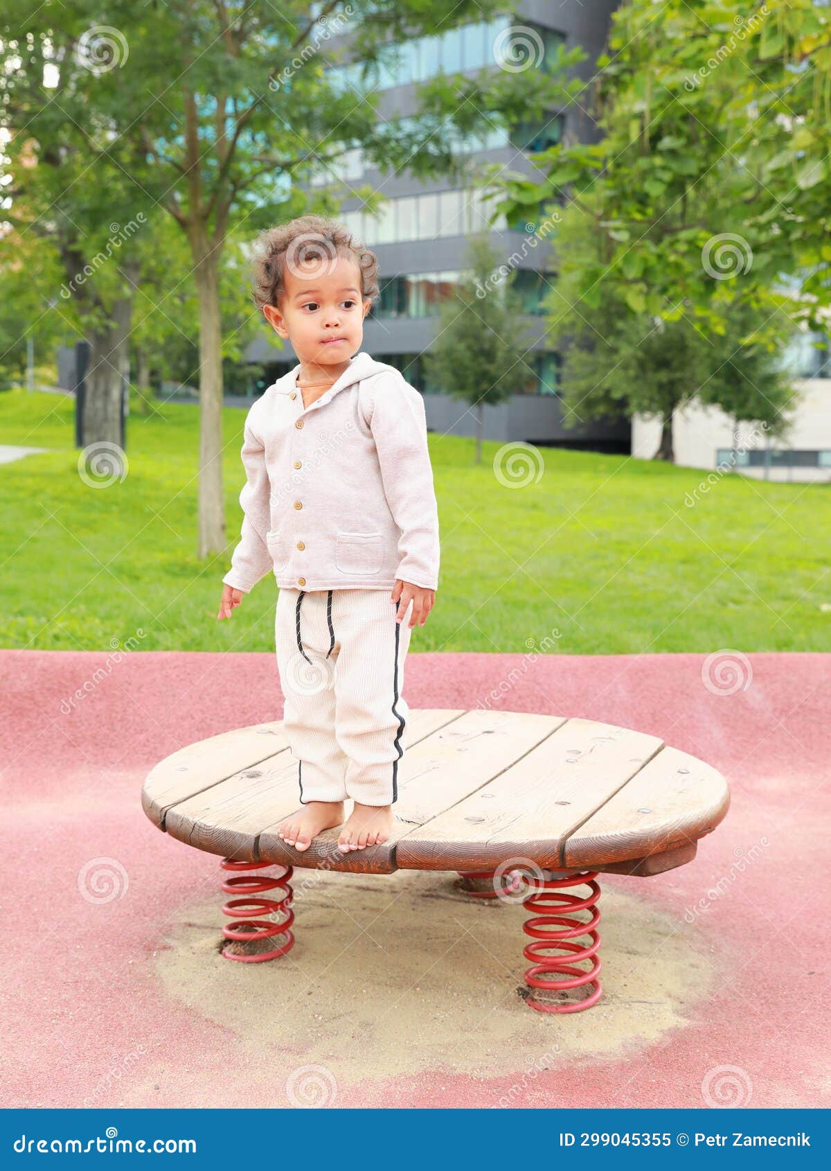 Toddler Boy Playing on Playground - Standing on Spring Platform Stock ...