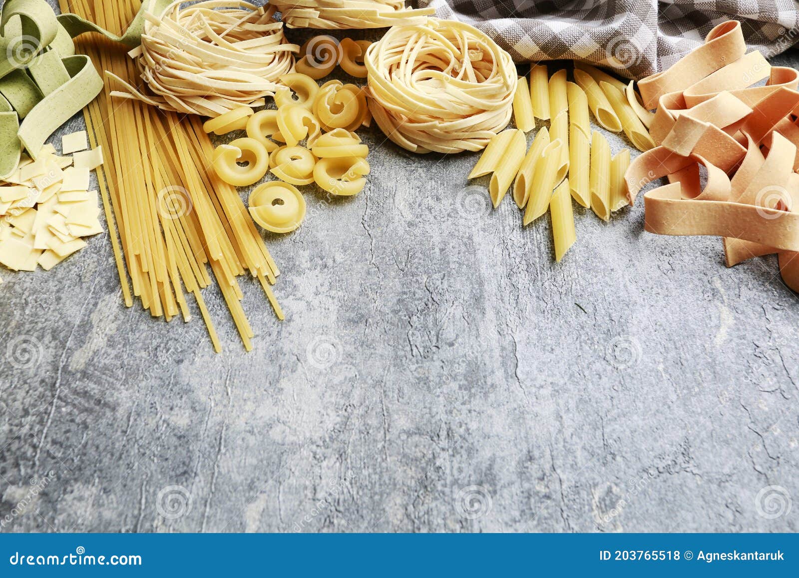 Mixed Types and Shapes of Italian Pasta on Grey Stone Background Stock ...