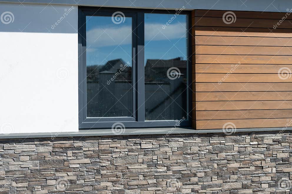 Mixed Wall Cladding of a Private House Stock Photo - Image of beige ...
