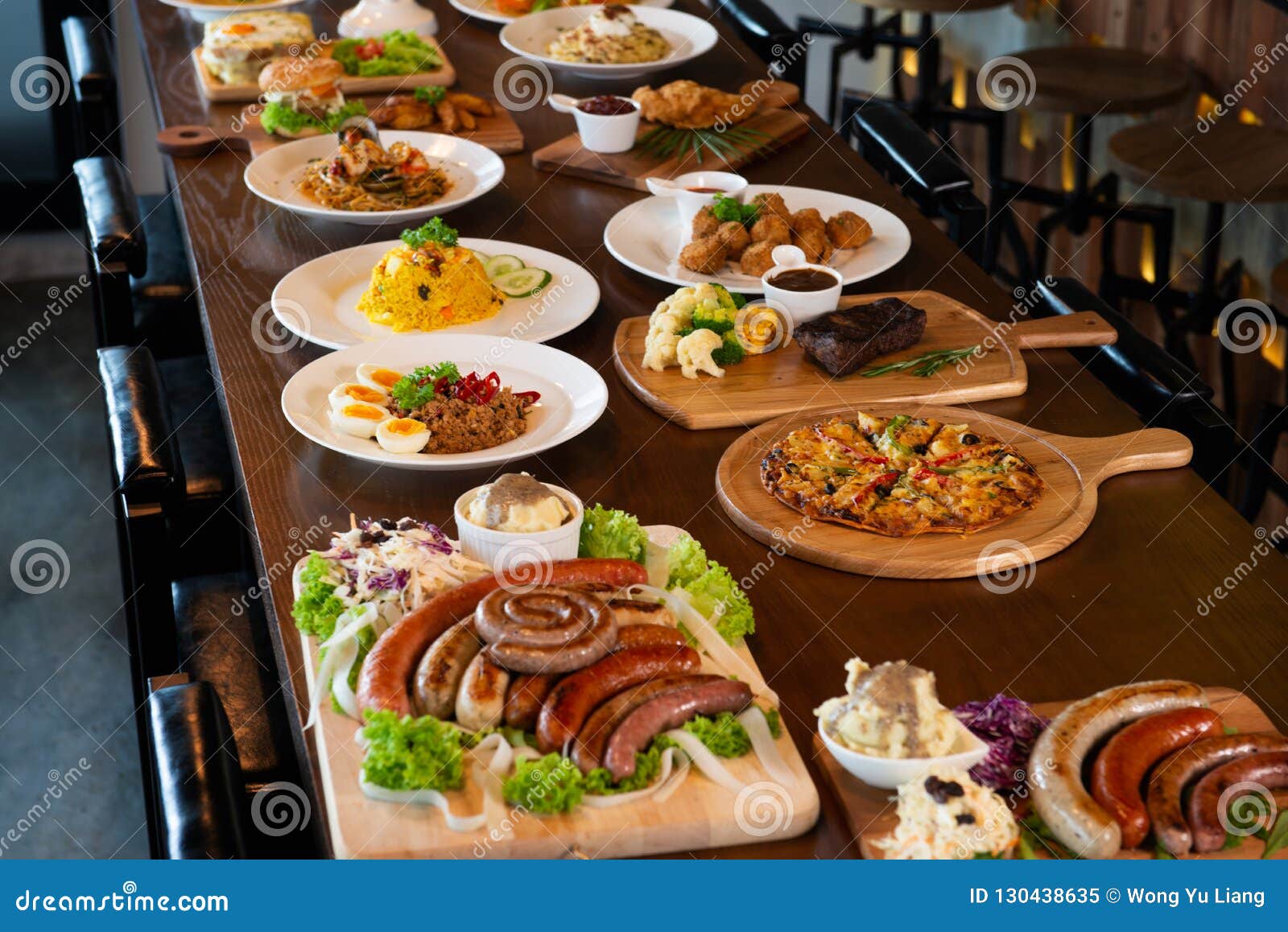 Mixed Western and Fusion Food Plates on Table Stock Image - Image of ...