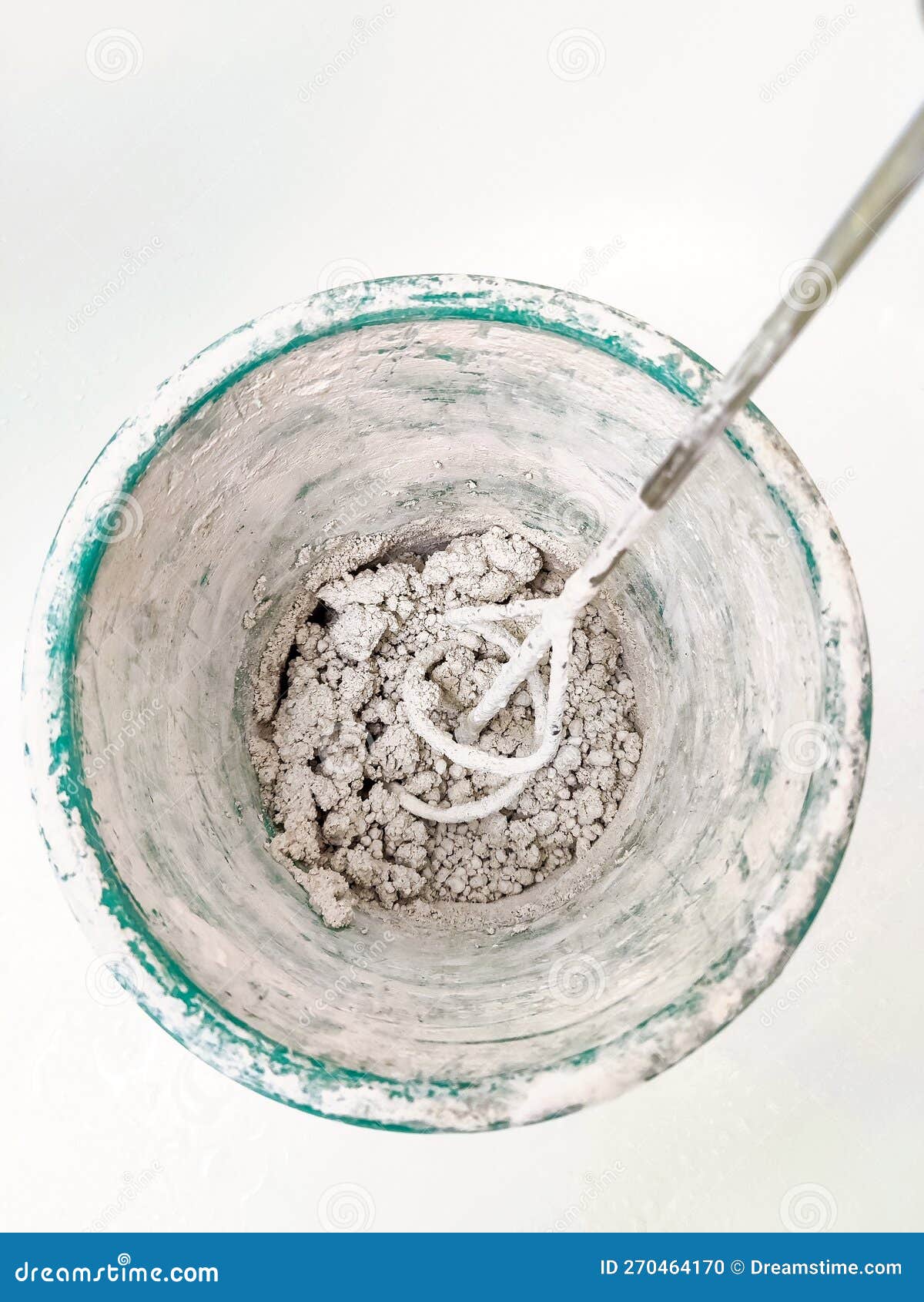 Mixer is Placed Inside an Old Plastic Bucket. Process of Manual Mixing ...